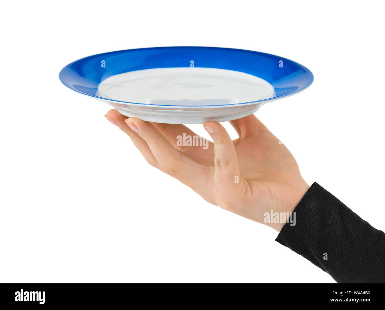 Hand with plate Stock Photo - Alamy