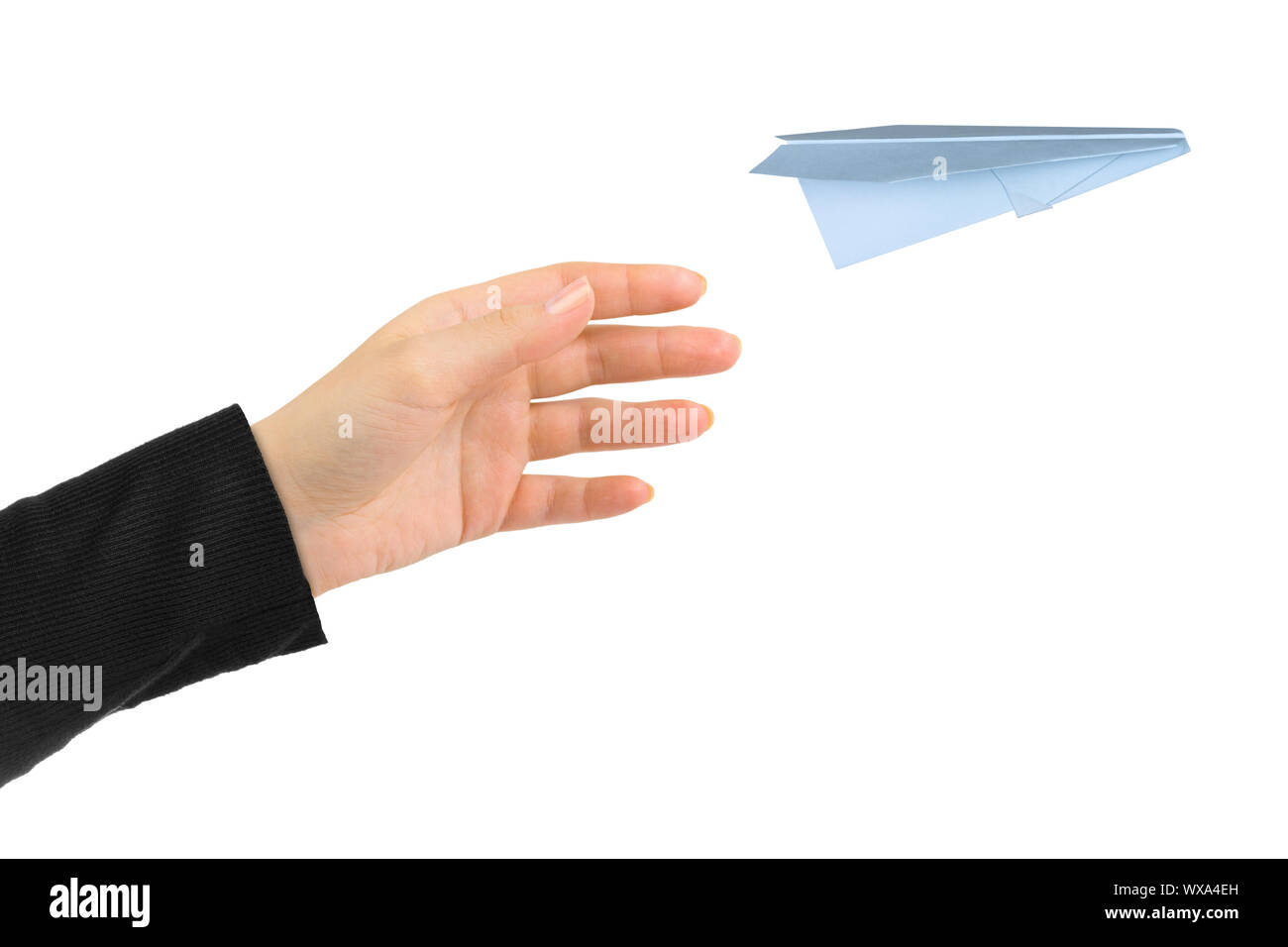 Hand and flying money plane Stock Photo - Alamy