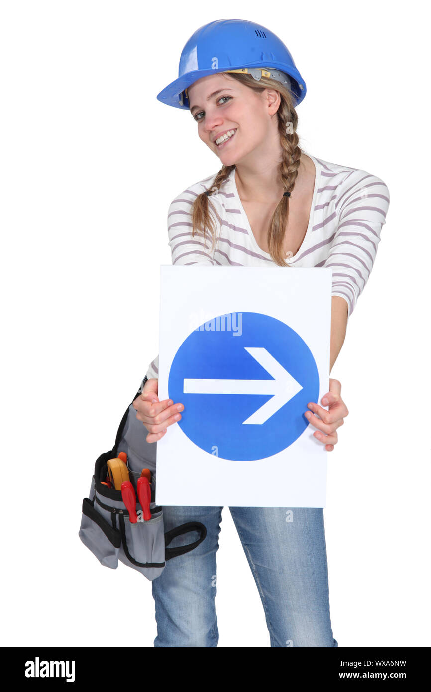 Woman holding traffic sign Stock Photo - Alamy