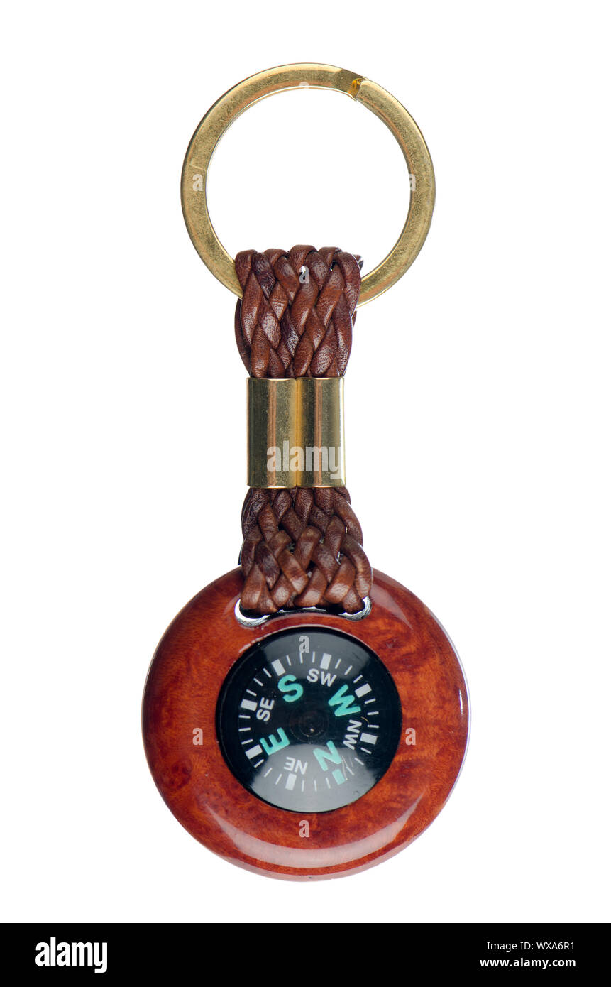 Keychain white compass isolated on white background Stock Photo - Alamy