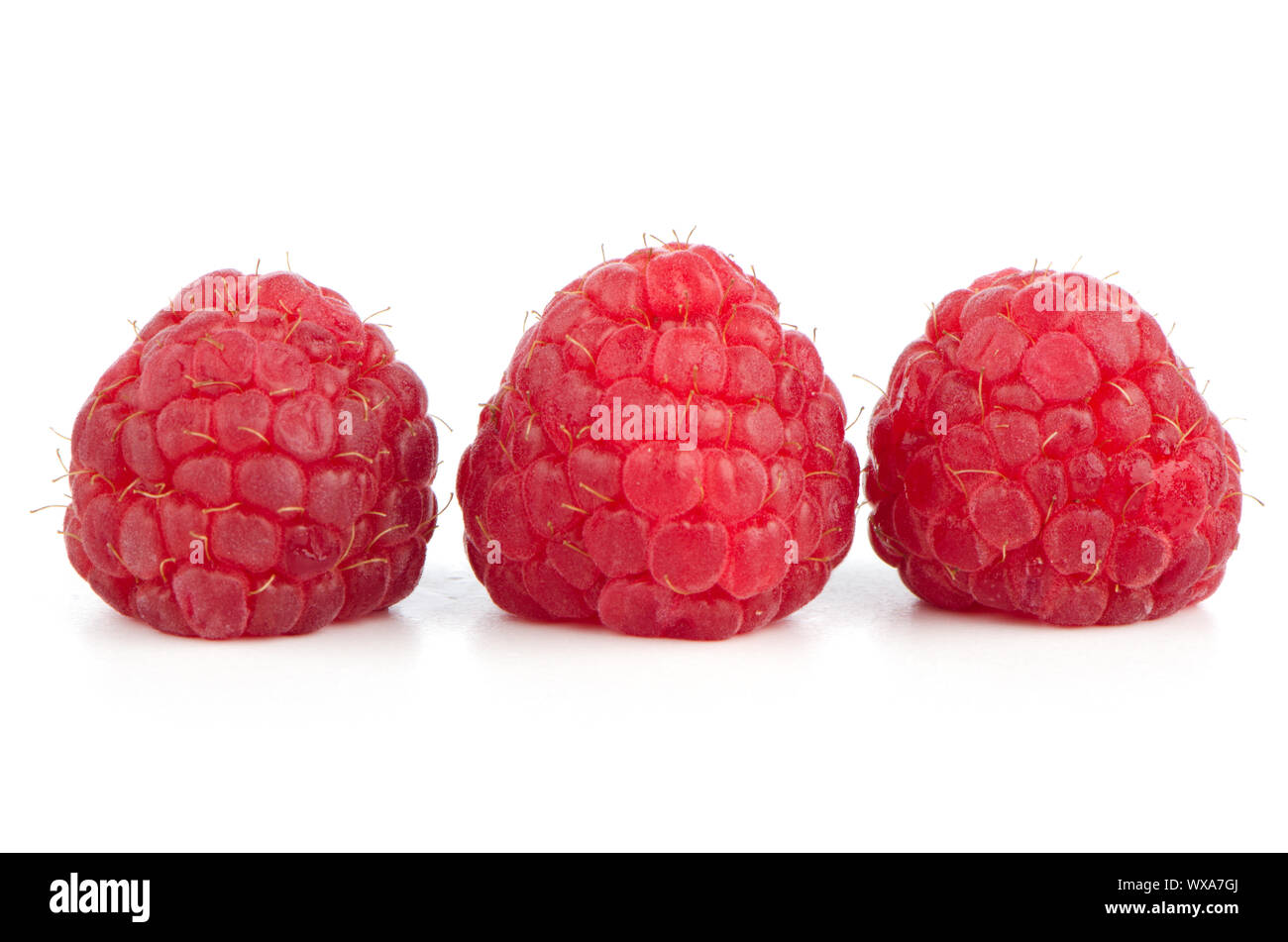 Ripe red raspberry on white background Stock Photo - Alamy