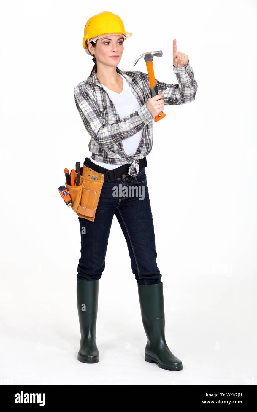 Mature woman using hammer hi-res stock photography and images - Alamy