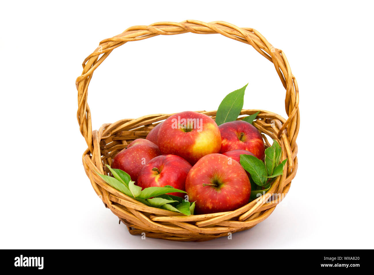 red apples in a basket Stock Photo - Alamy