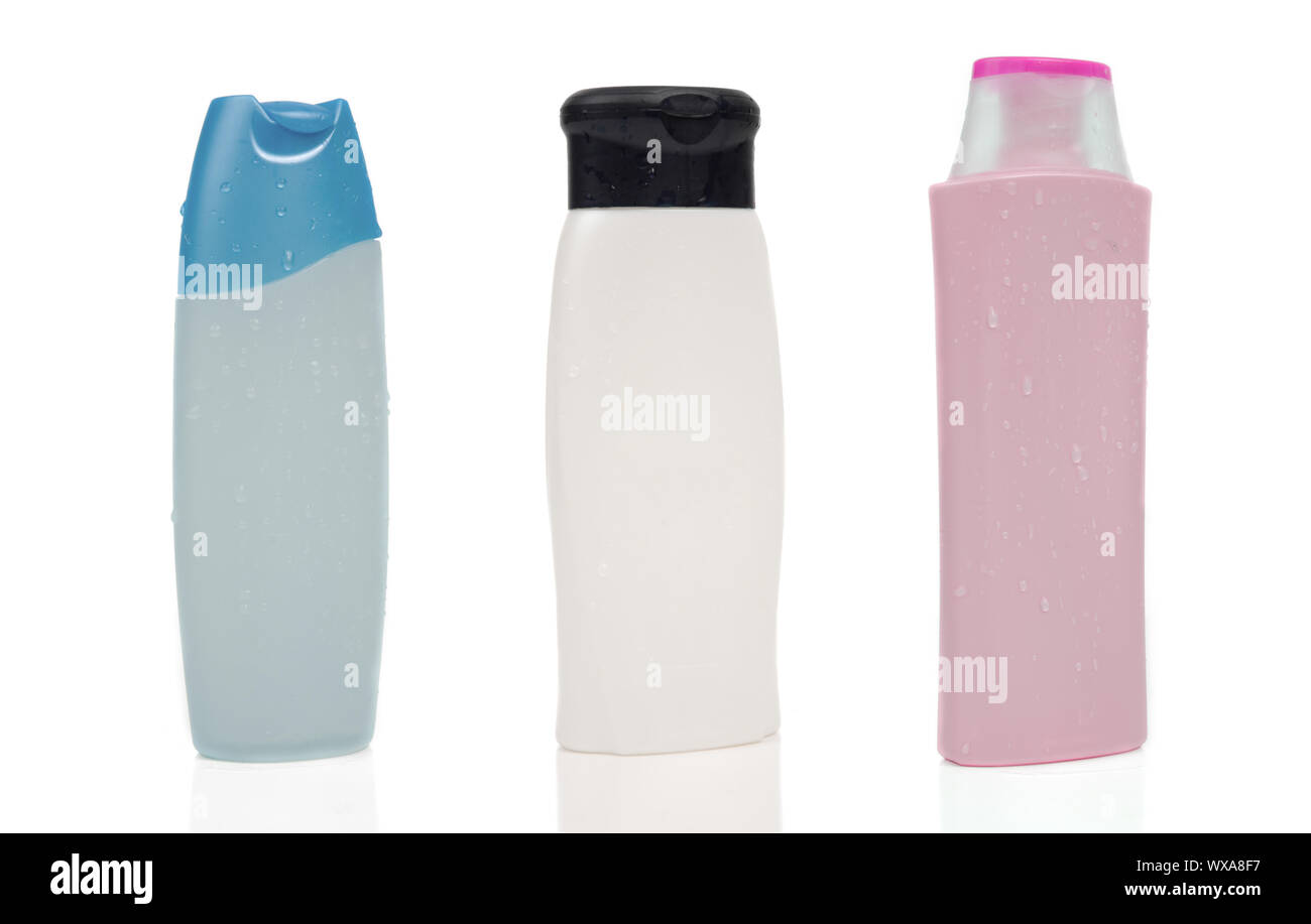 Three blank shampoo bottles on white background Stock Photo - Alamy