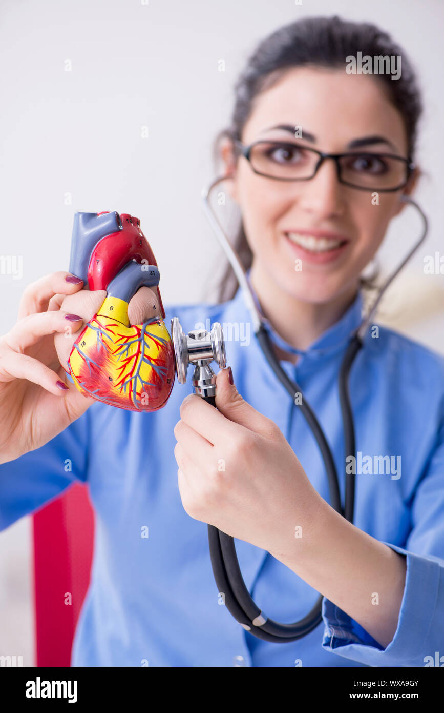 Young female doctor working in the clinic Stock Photo - Alamy