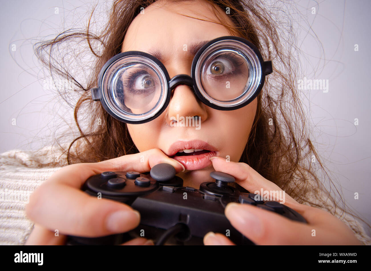 Funny nerd girl working on computer Stock Photo - Alamy