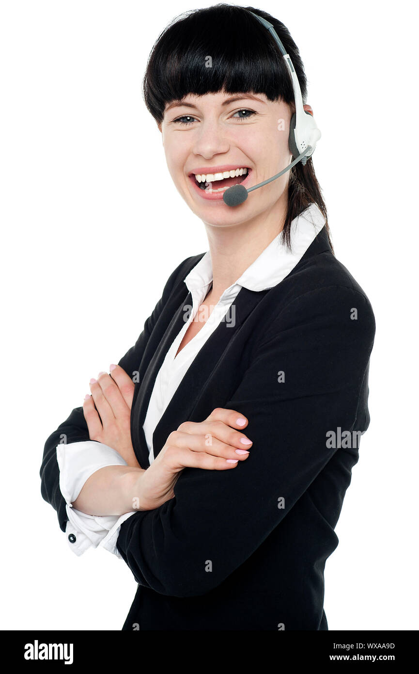 Customer support executive enjoying her work. Posing with confidence ...