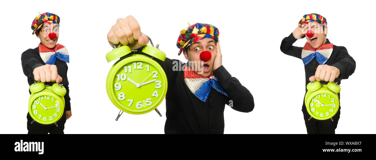 Funny clown with clock isolated on white Stock Photo - Alamy