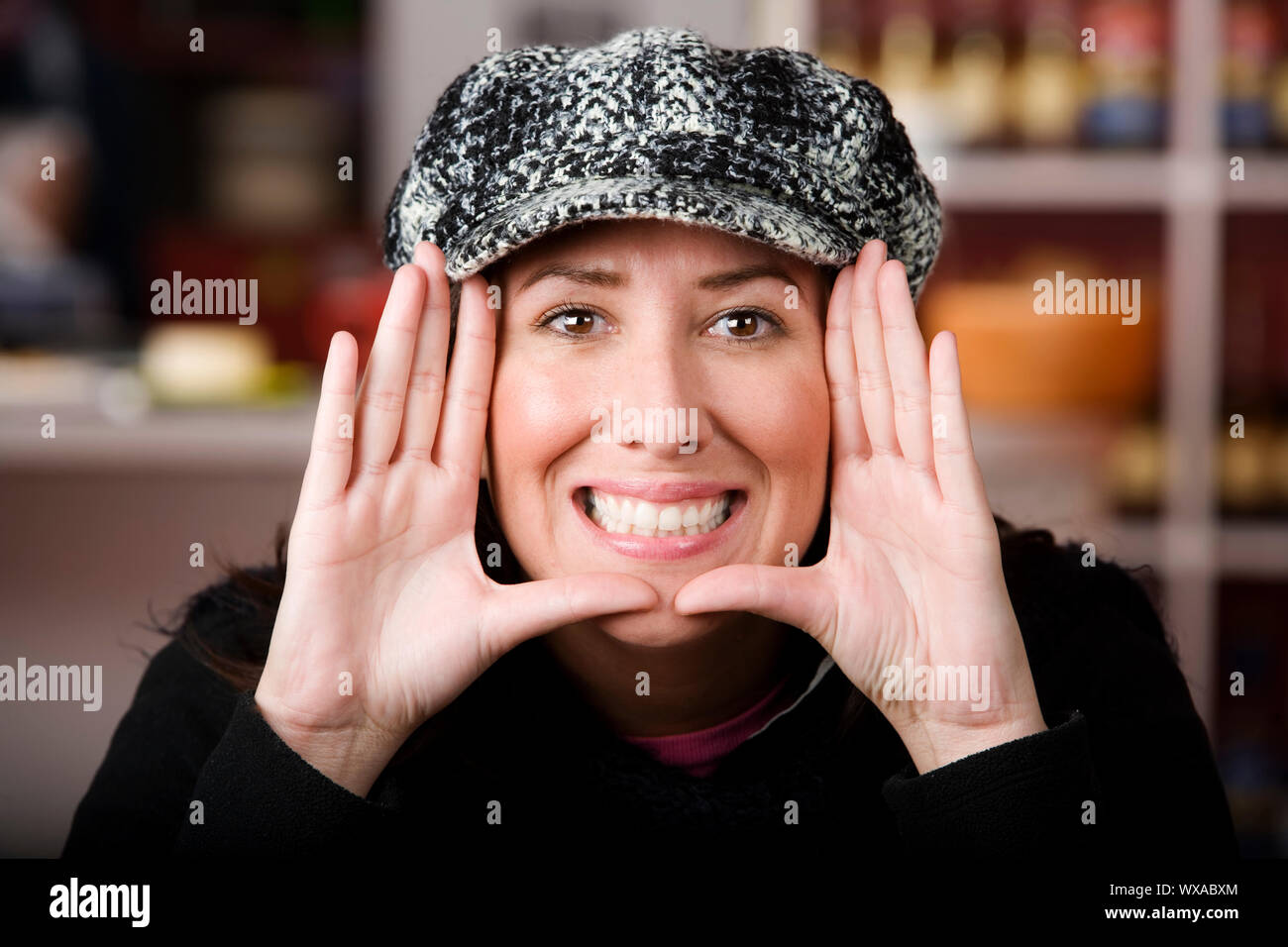 Pretty Woman Framing Face with her Hands Stock Photo - Alamy