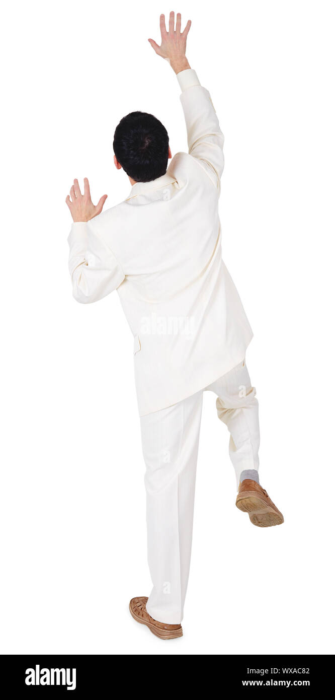 Man tries to reach something high, isolated on a white background Stock ...