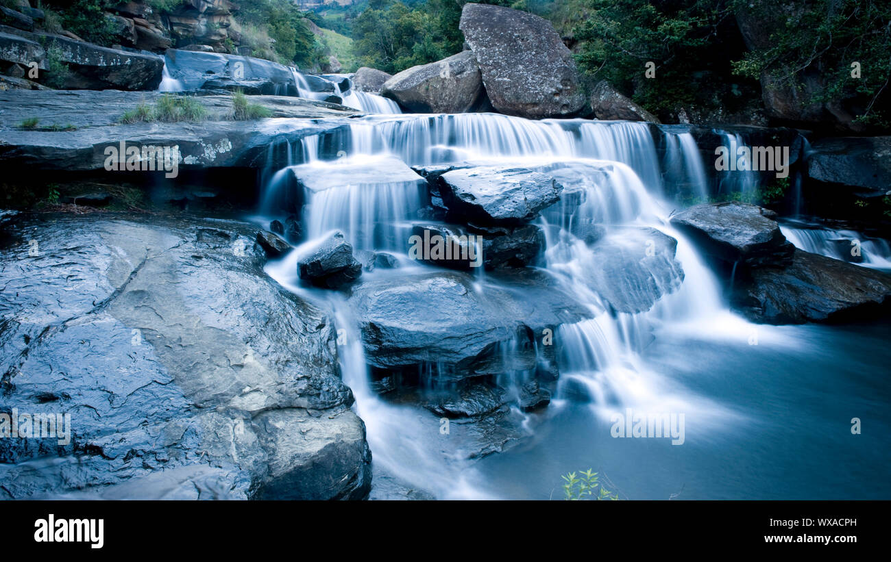 Cascading waterfall with motion blurred water movement Stock Photo - Alamy
