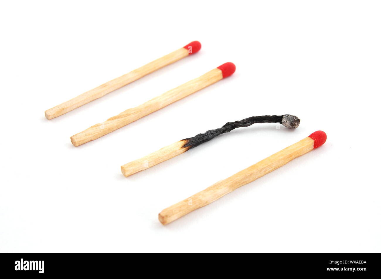 Some red matches isolated on a white background Stock Photo - Alamy