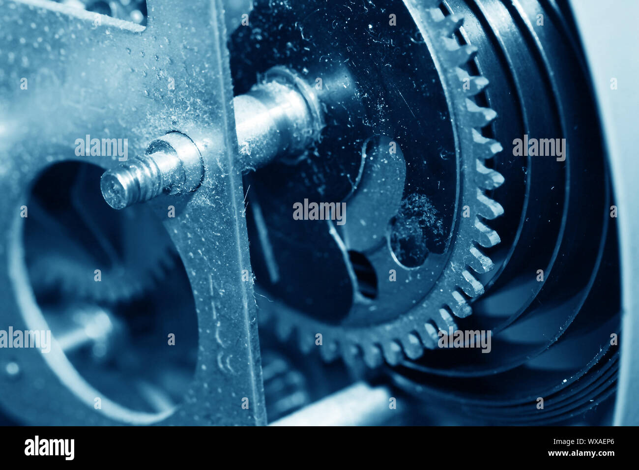 time gear inside my rare clock Stock Photo - Alamy