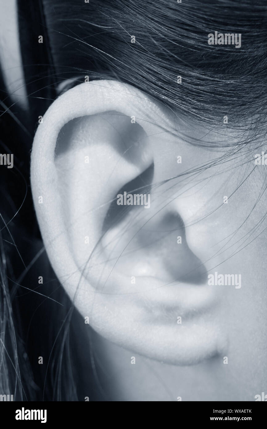 ear girl close up listening sound Stock Photo - Alamy