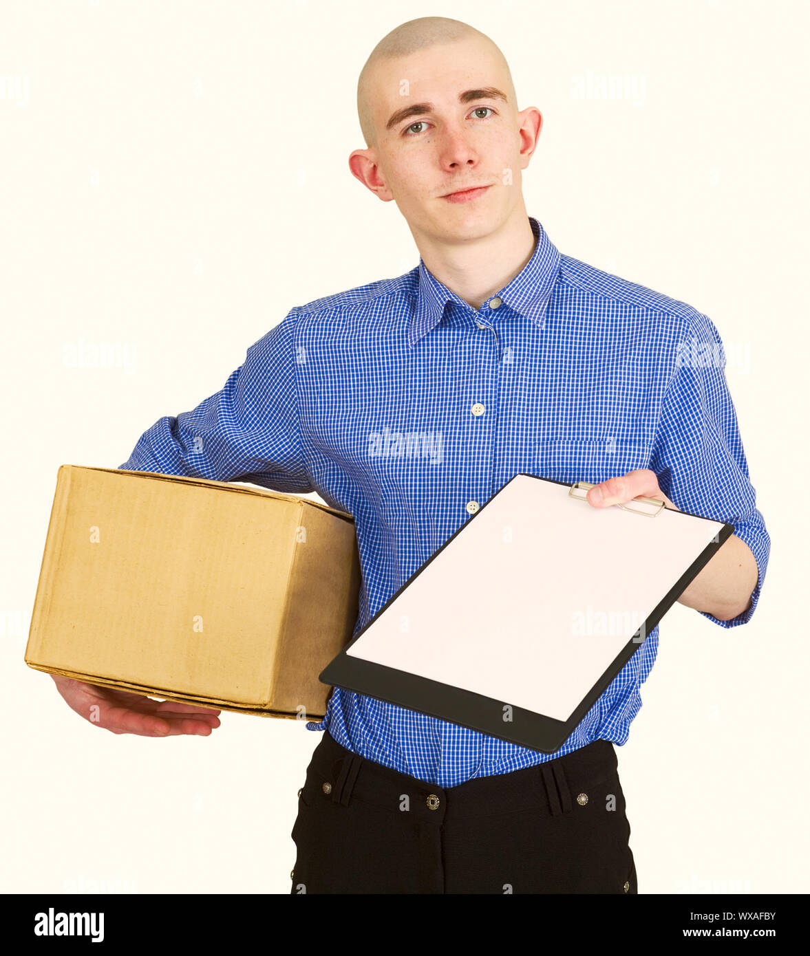 Man with carton box stretches us tablet Stock Photo - Alamy