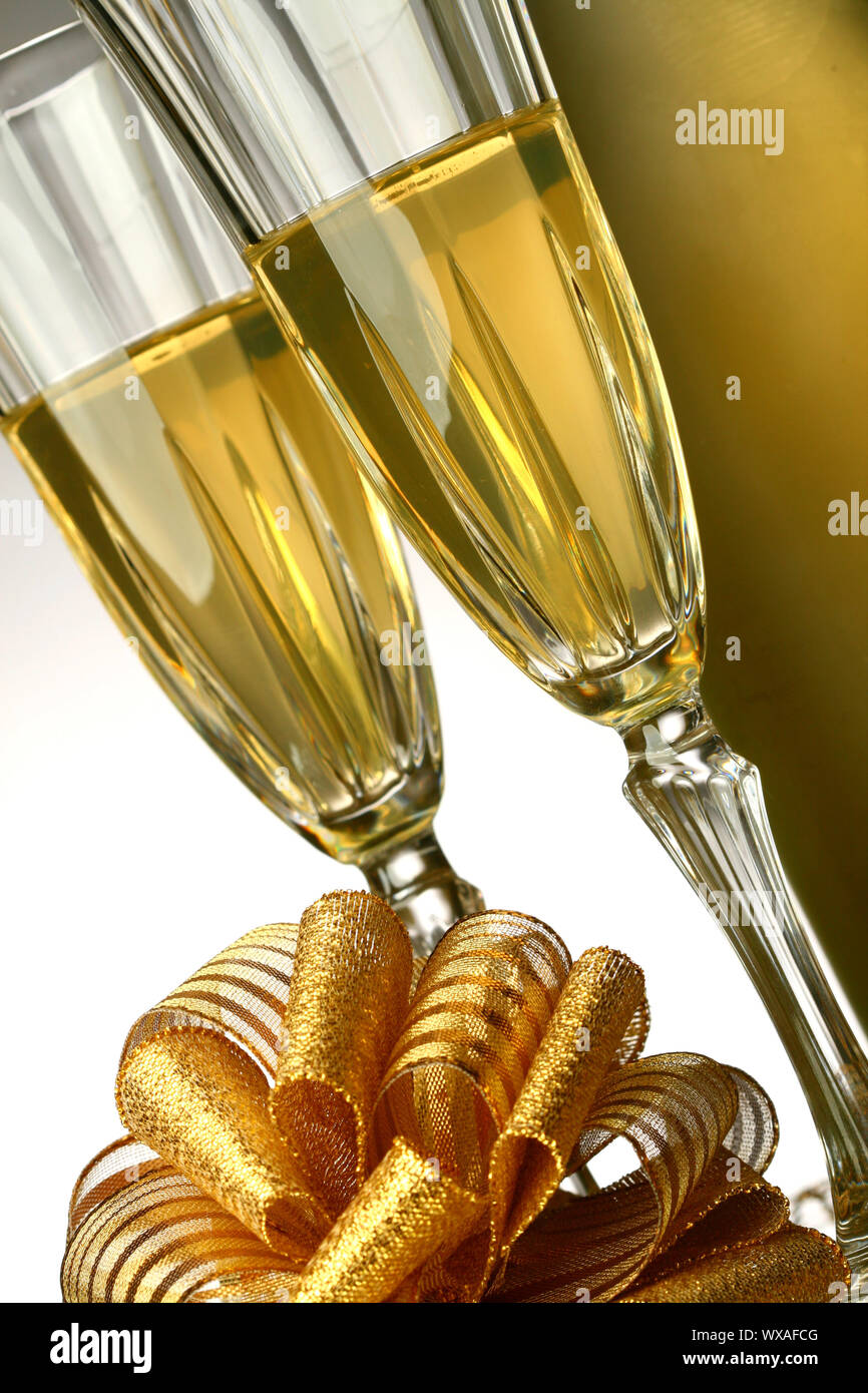 holiday card golden champagne and gift Stock Photo - Alamy