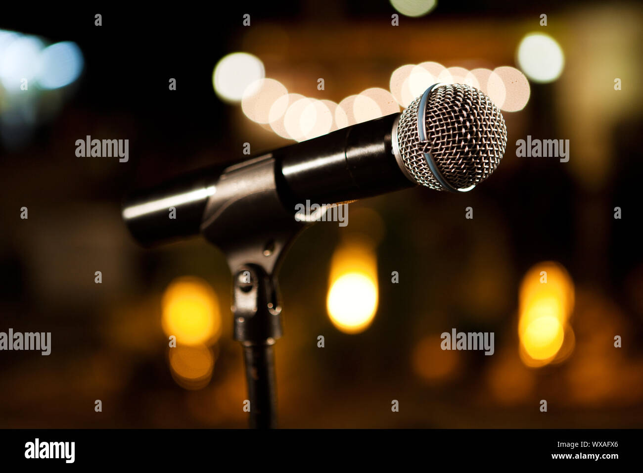 Music background with microphone and Concert lights Stock Photo - Alamy