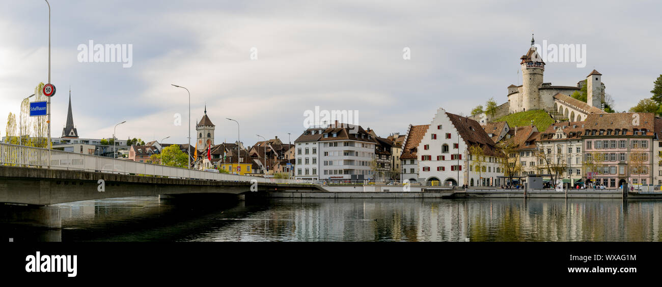 view of the historic Swiss city of Schaffhausen with the bridge leading ...