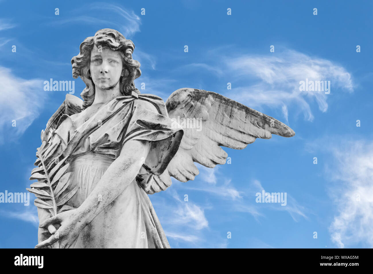 Female angel statue with clouds hi-res stock photography and images - Alamy