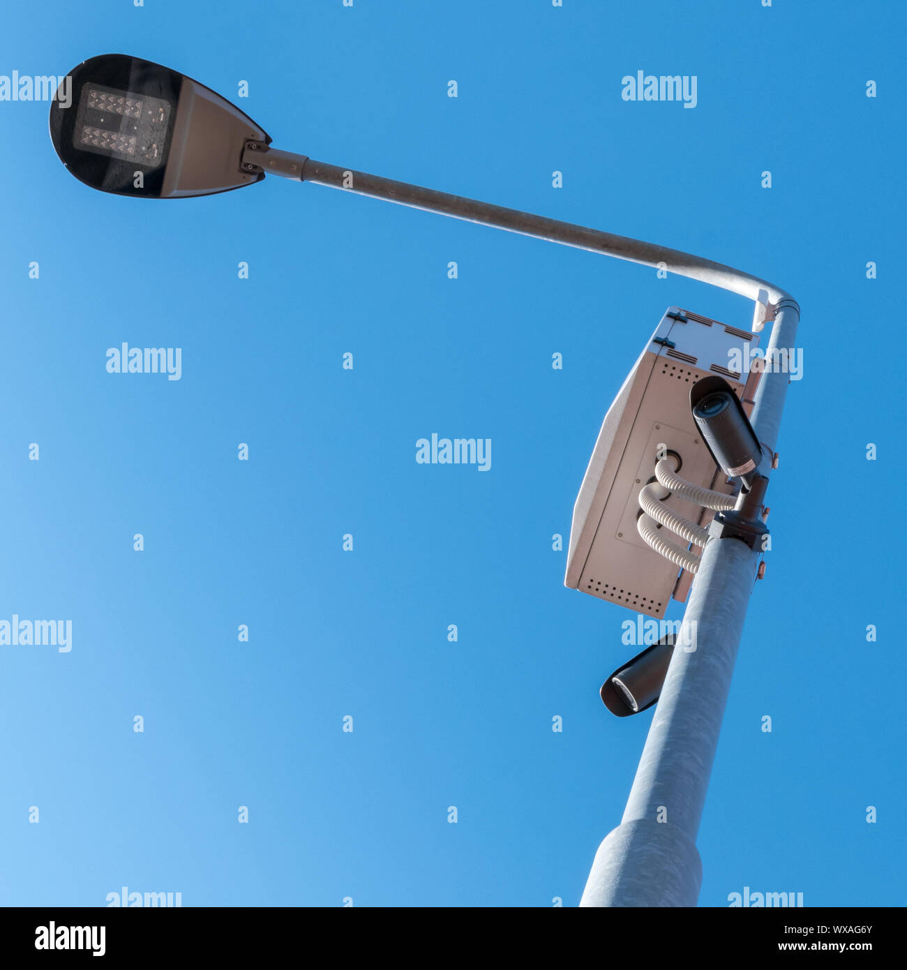 Street lamp with CCTV camera Stock Photo - Alamy
