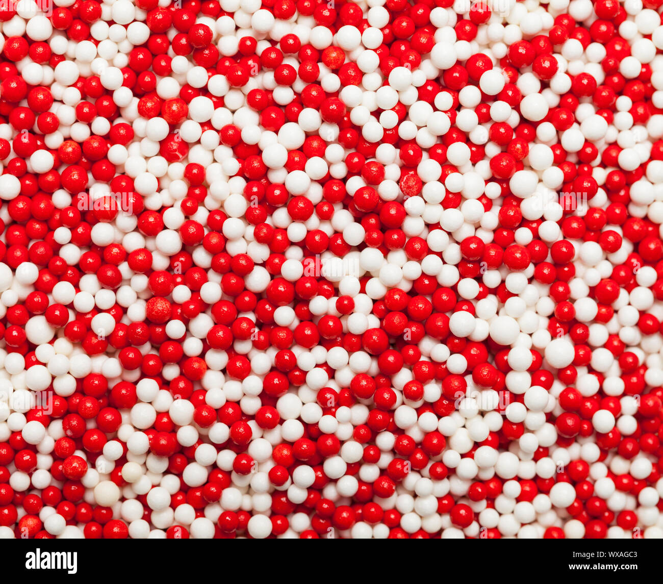 Red and white sugar candy hi-res stock photography and images - Alamy