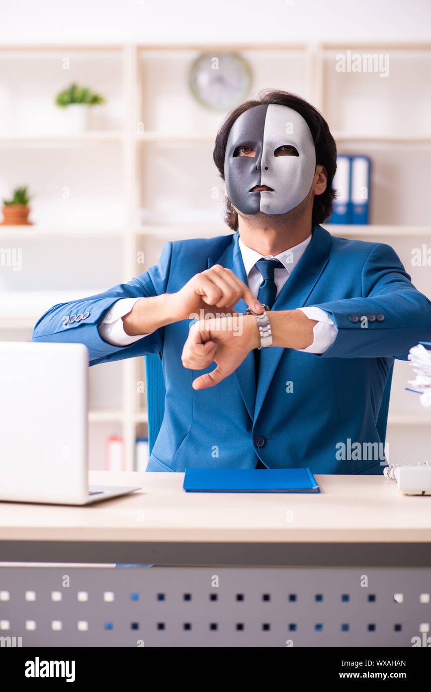 Male employee in the office in industrial espionage concept Stock Photo ...