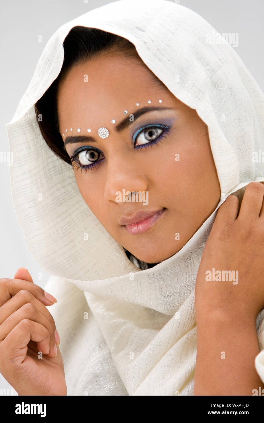 Beautiful woman with white head scarf, isolated Stock Photo - Alamy