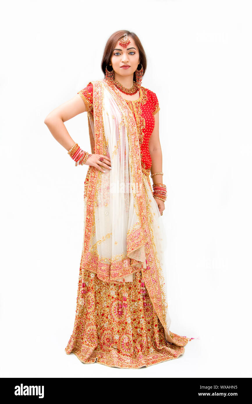 Beautiful Bengali bride in colorful dress, isolated Stock Photo - Alamy