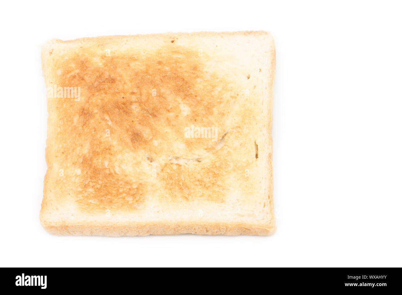 Single toasted bread on white background Stock Photo - Alamy