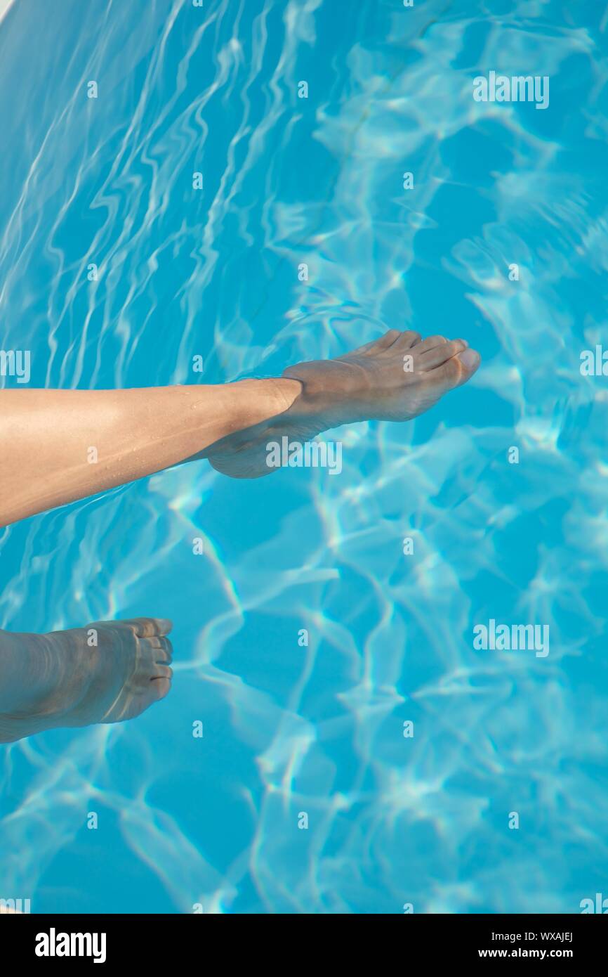 woman barefoot at swimming pool in Asturias Spain Stock Photo - Alamy