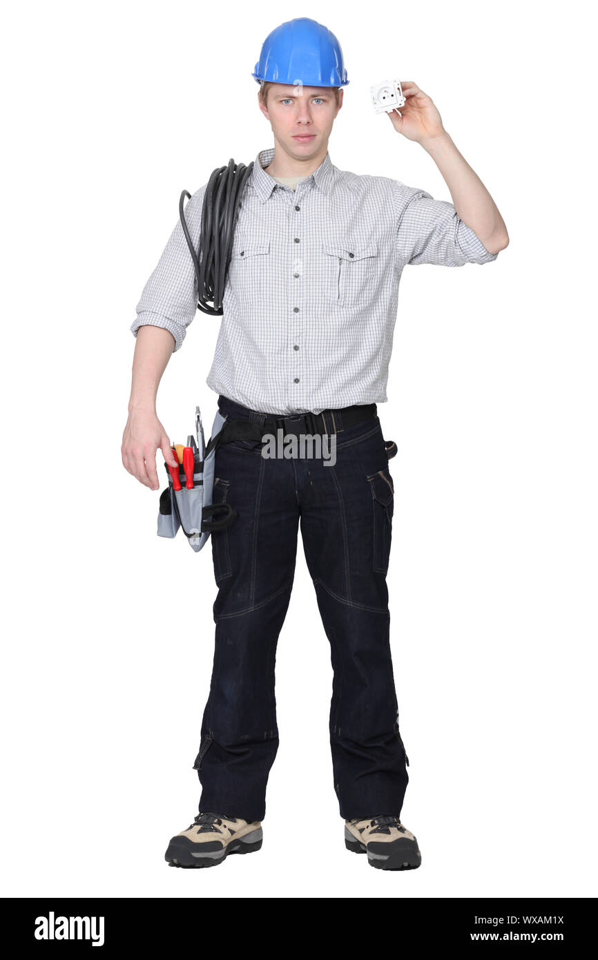 Electrician holding cable and electrical socket Stock Photo - Alamy