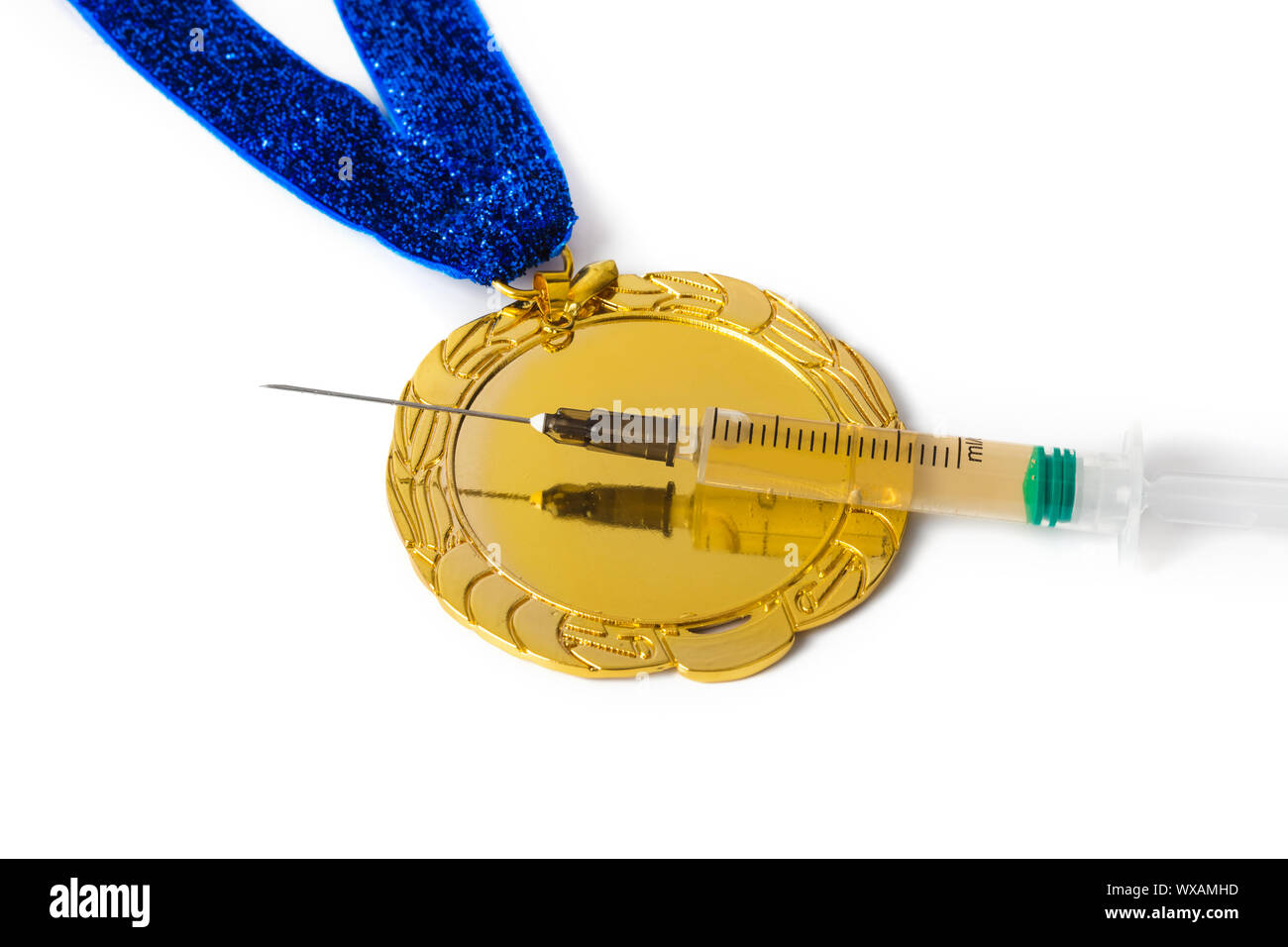 Gold medal and syringe Stock Photo - Alamy