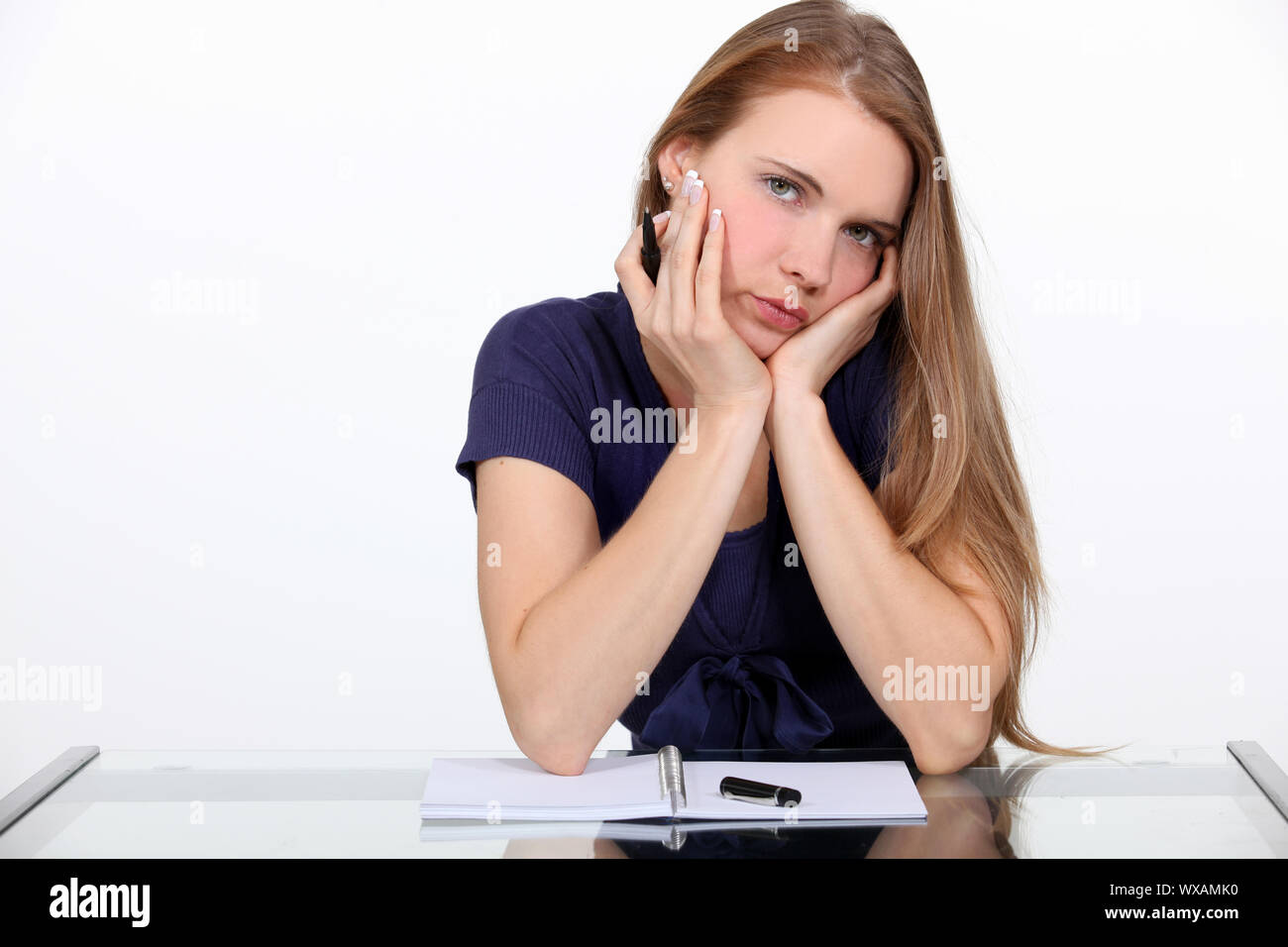 Woman writing in her diary Stock Photo - Alamy