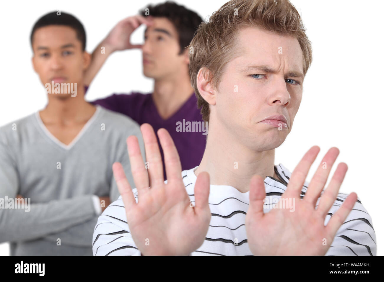 group male students quarreling Stock Photo - Alamy