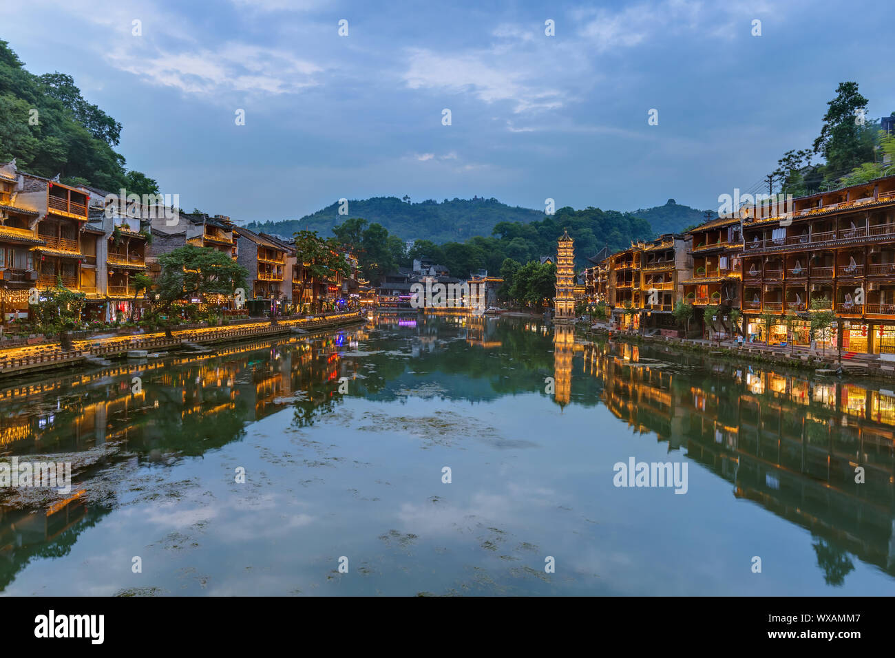 Ancient town Fenghuang at sunset in Hunan China Stock Photo - Alamy