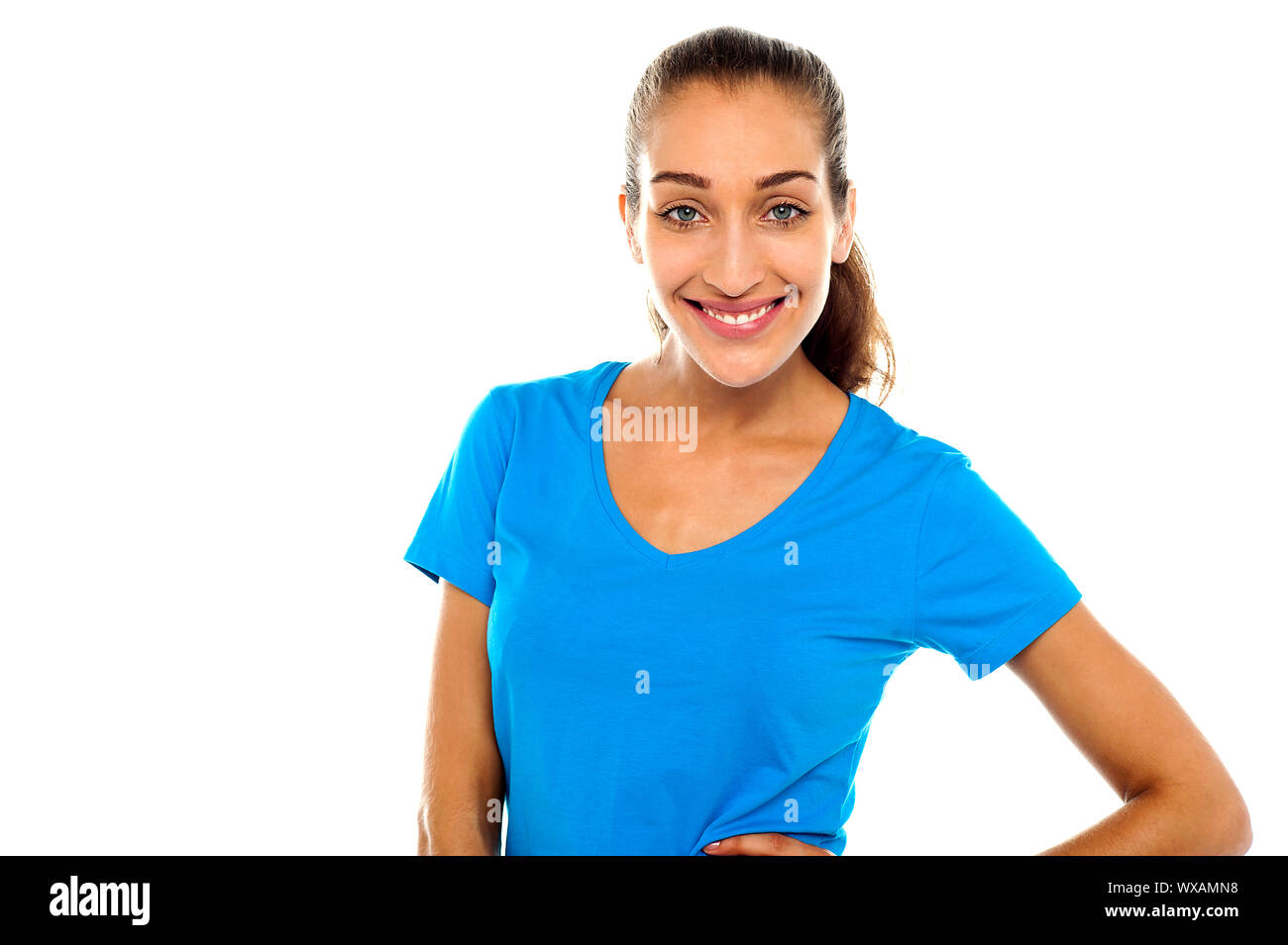 Pretty woman posing with hand on her waist. All on white background ...