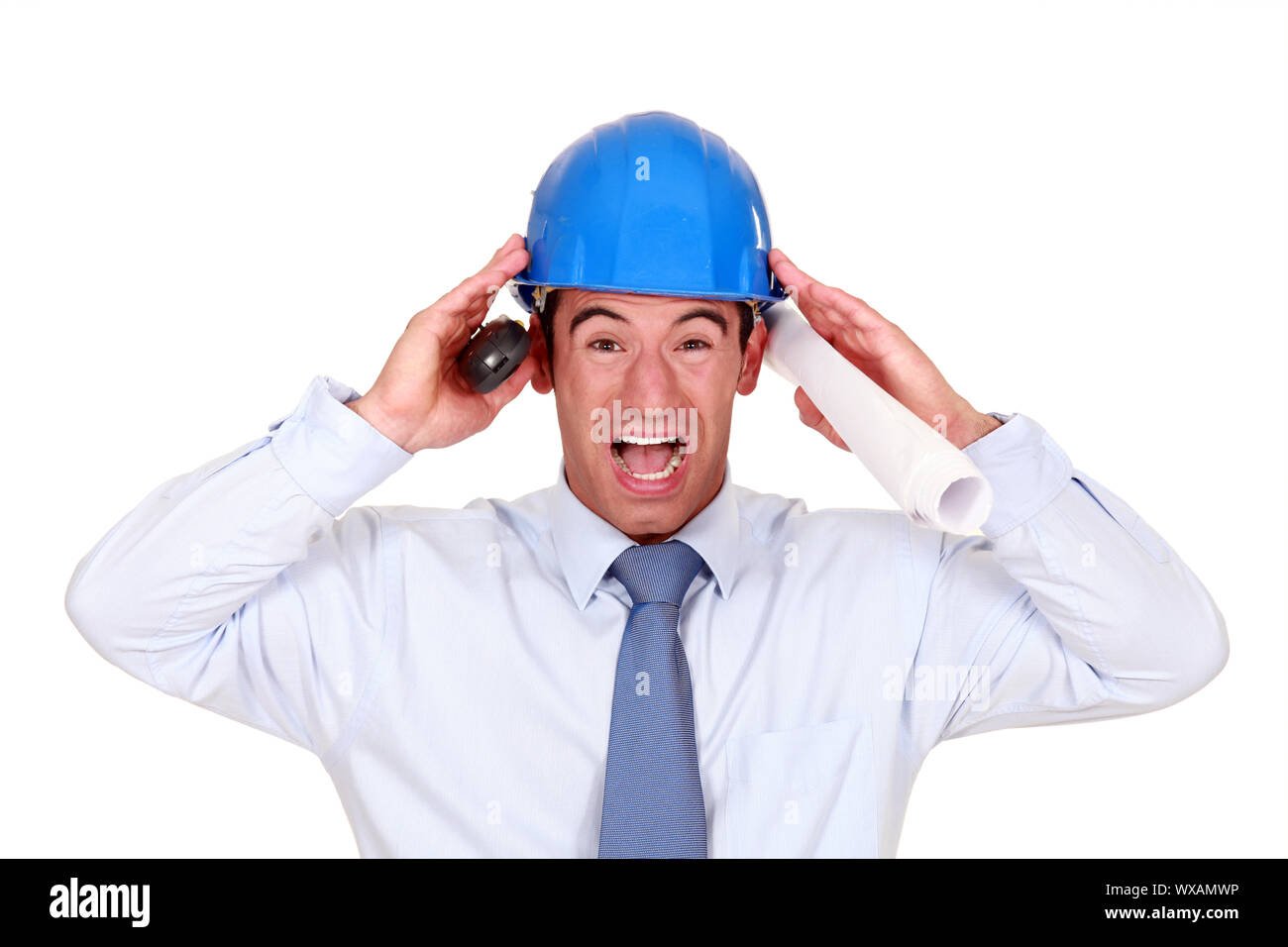 businessman with a helmet having a headache Stock Photo - Alamy