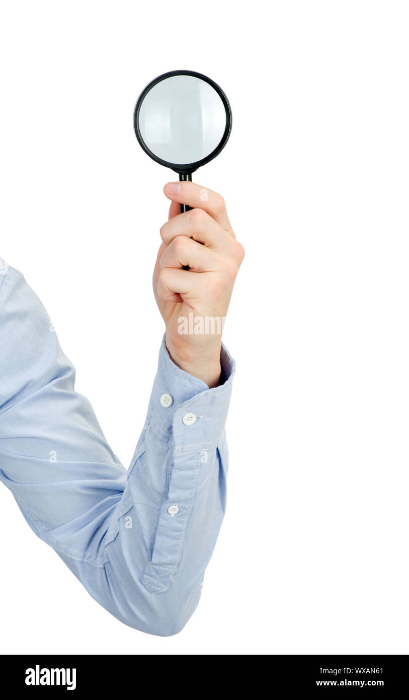 Man's hand holding magnifying glass Stock Photo - Alamy