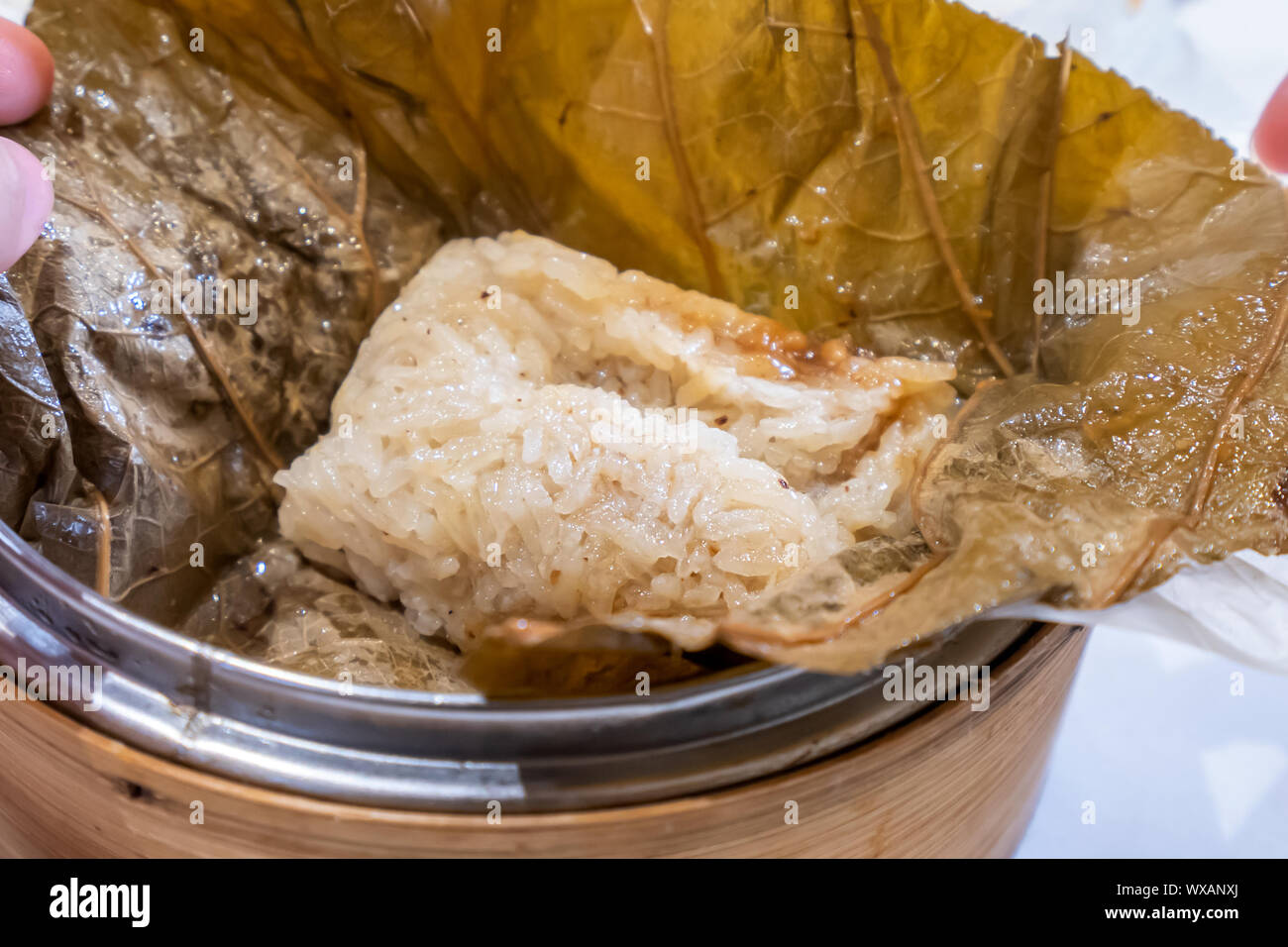 Delicious Lo Mai Gai dim sum, fresh steamed glutinous rice with chicken ...