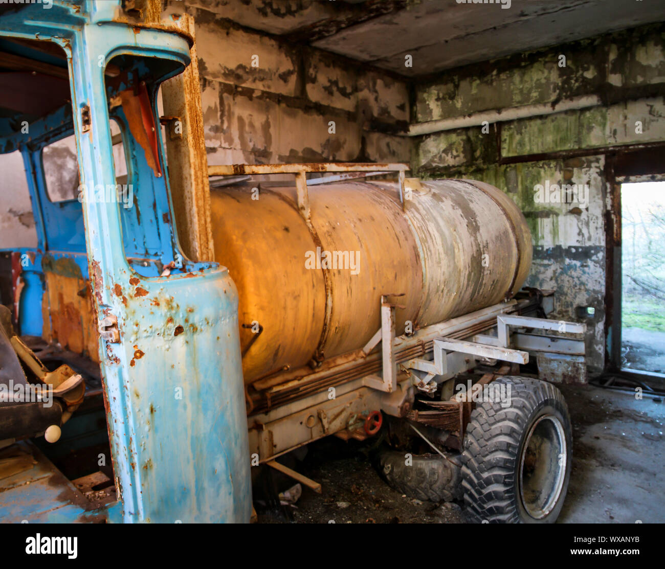 Old mock manure transporter Stock Photo - Alamy