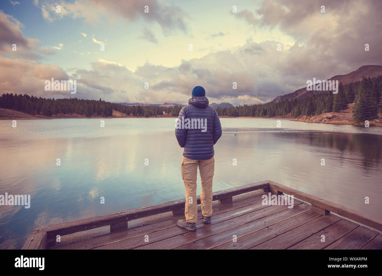 Man on the lake Stock Photo - Alamy