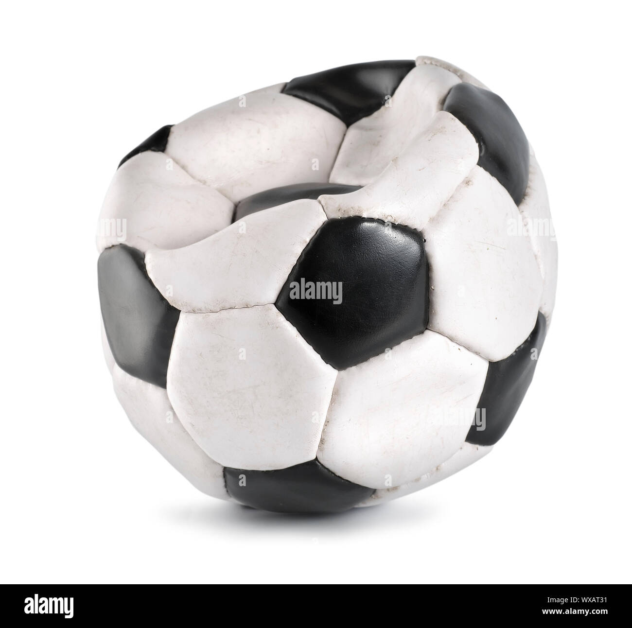 Deflated soccer ball isolated on white background Stock Photo - Alamy