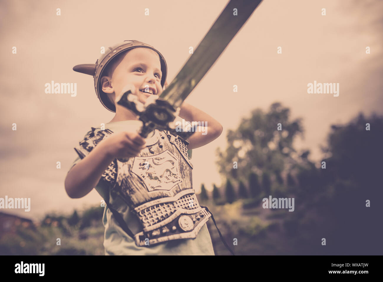 Boy dressed as a fearless knight Stock Photo - Alamy