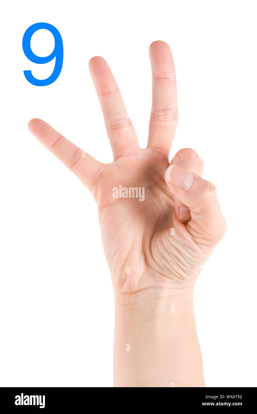 Hand showing number nine isolated on a white background Stock Photo - Alamy
