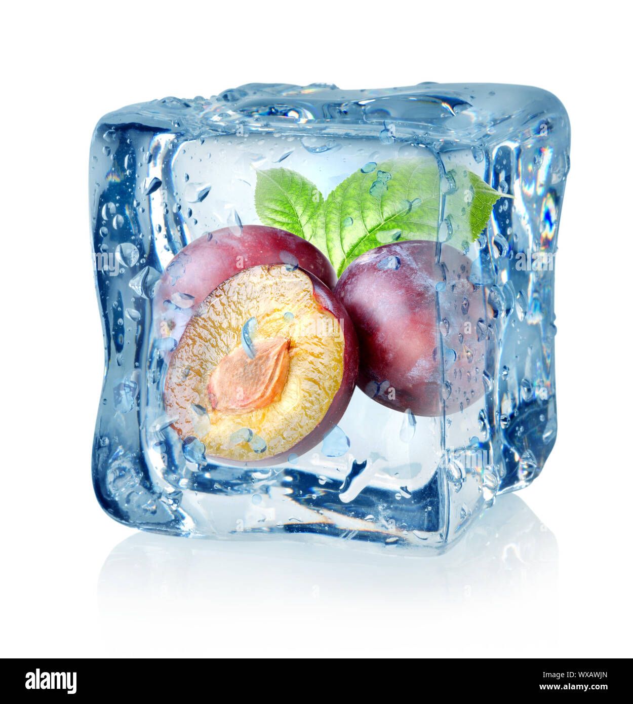 Ice cube and plum isolated on a white background Stock Photo - Alamy