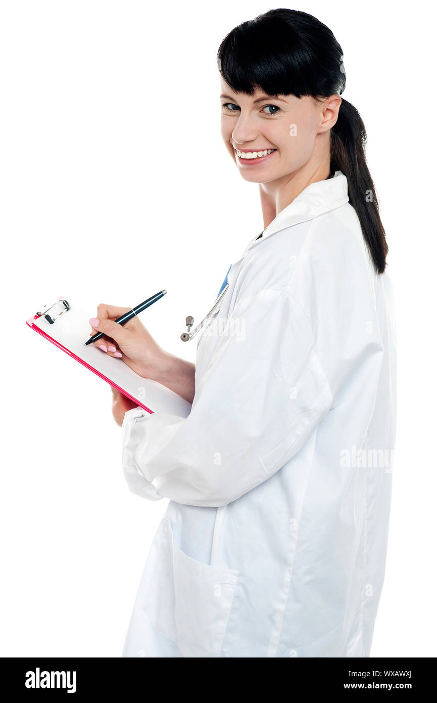 Nurse writing fresh prescription for the patient isolated against white ...