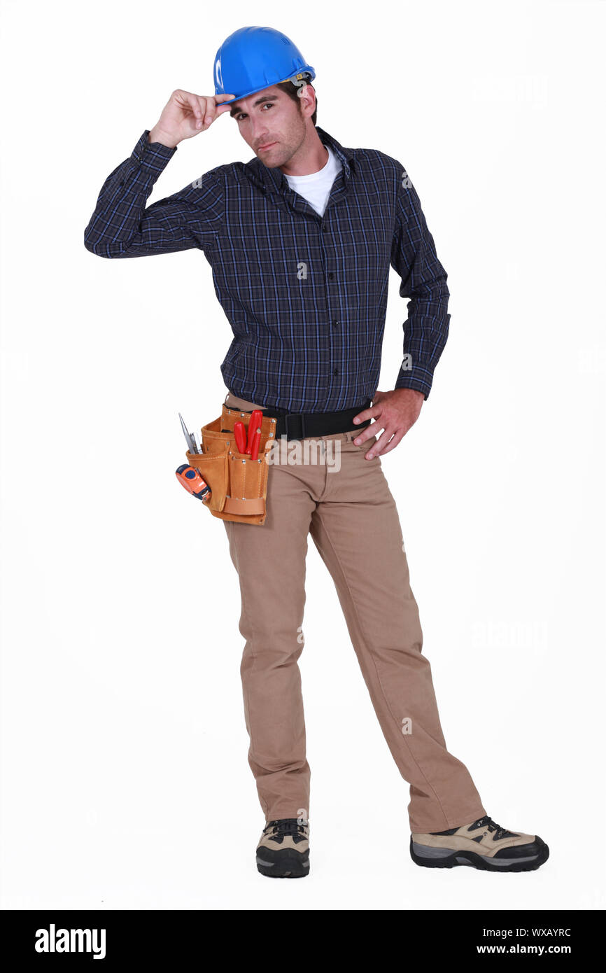 Tradesman giving a salute Stock Photo - Alamy