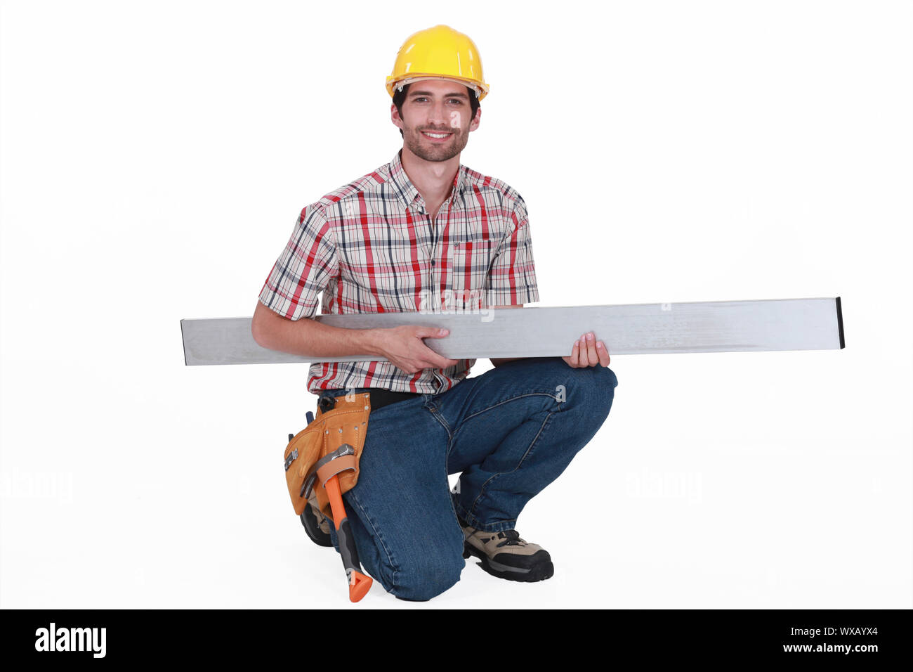 Man carrying metal beam hi-res stock photography and images - Alamy