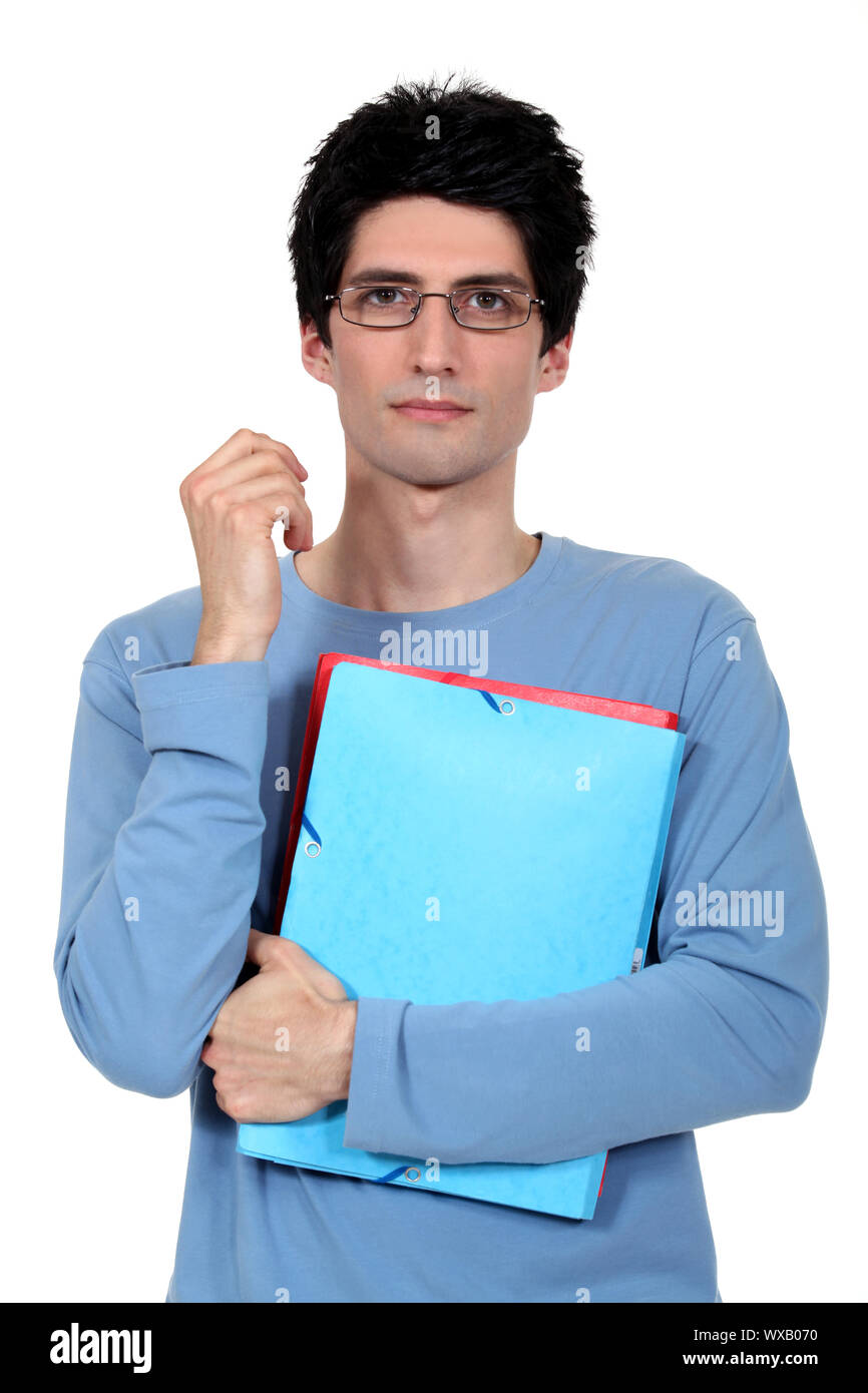 Student holding files Stock Photo - Alamy
