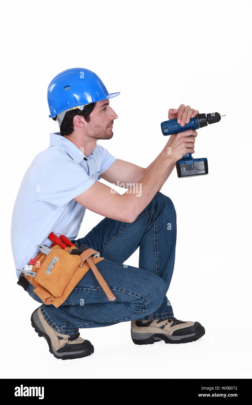 man using screwdriver Stock Photo - Alamy